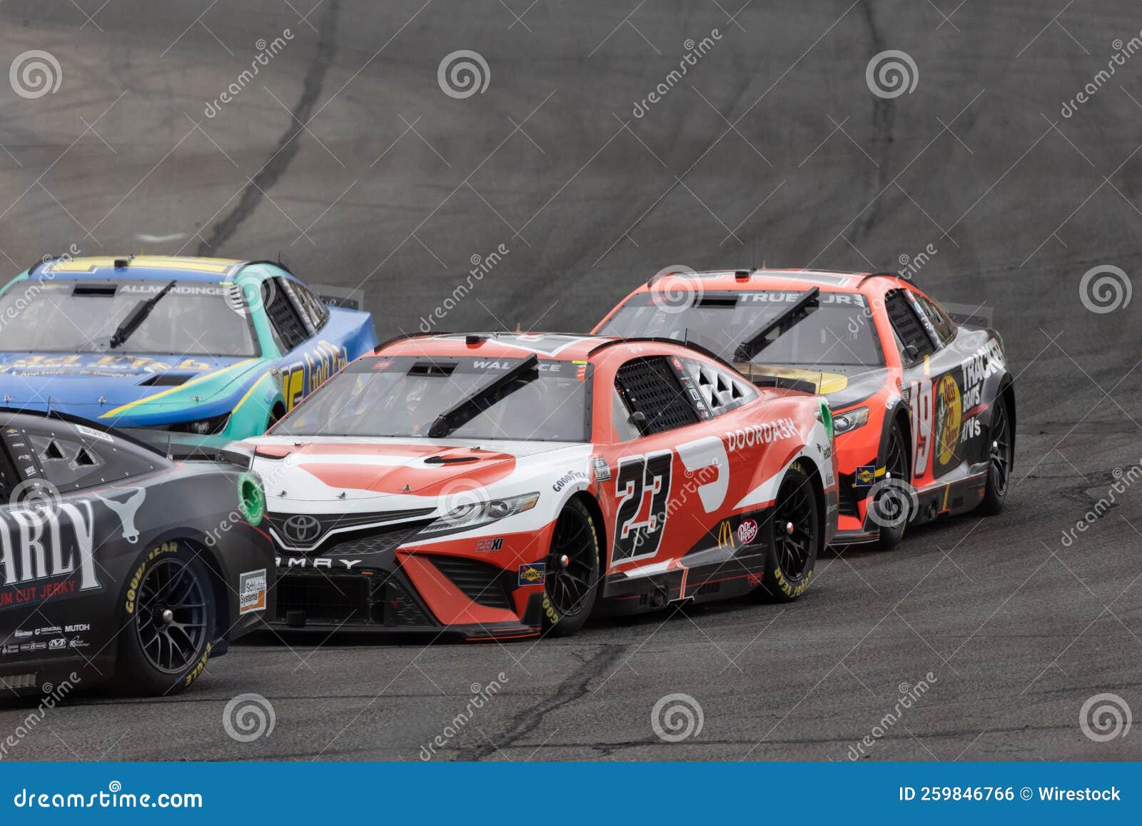 Race Cars Around a Turn in the Track Editorial Photo - Image of wheels ...