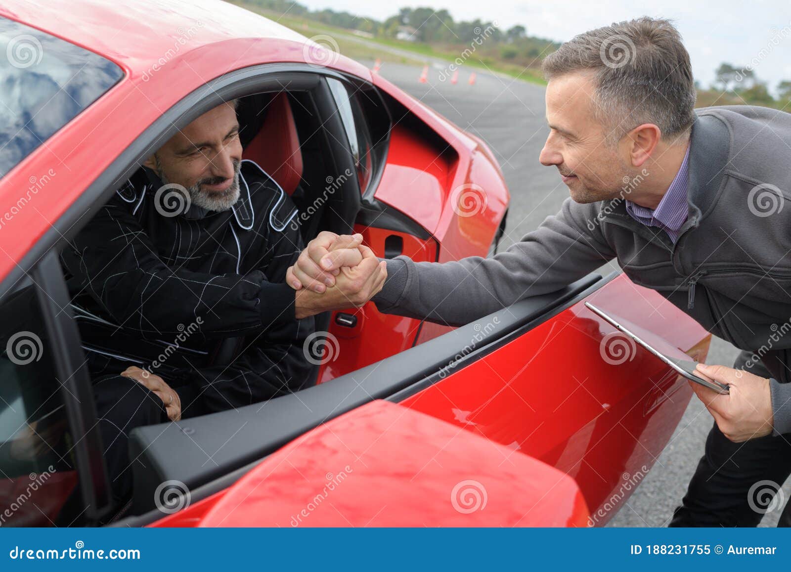 Race Pilot and Engineer Shaking Hands on Race Track Stock Image - Image ...