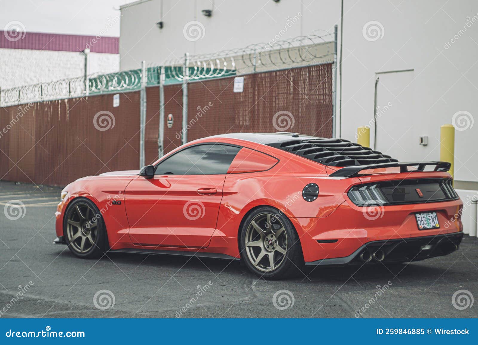 Race red Ford Mustang GT. editorial image. Image of road - 259846885