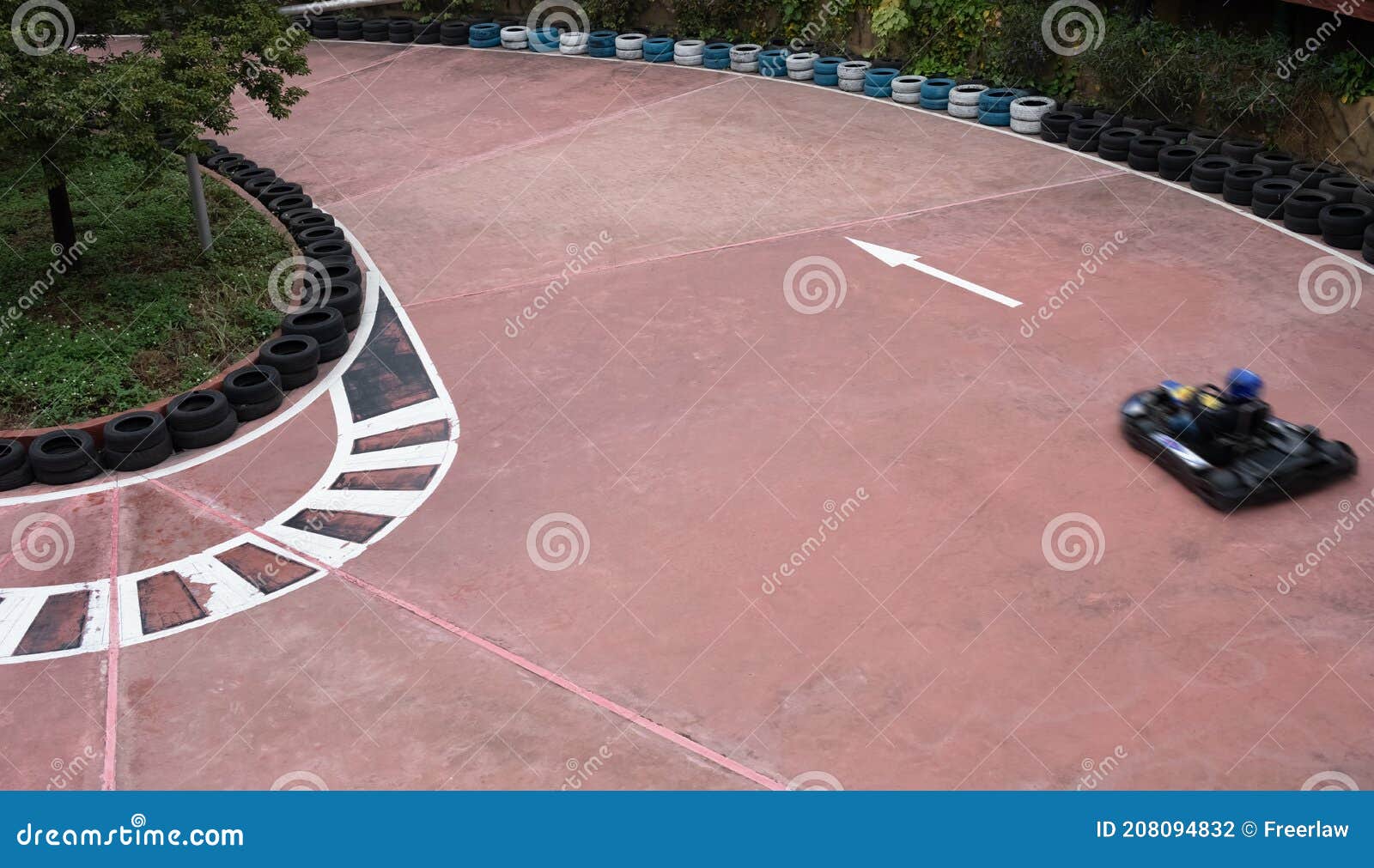 Race Track in the Outdoor with a Racecar Passing by Horizontal ...