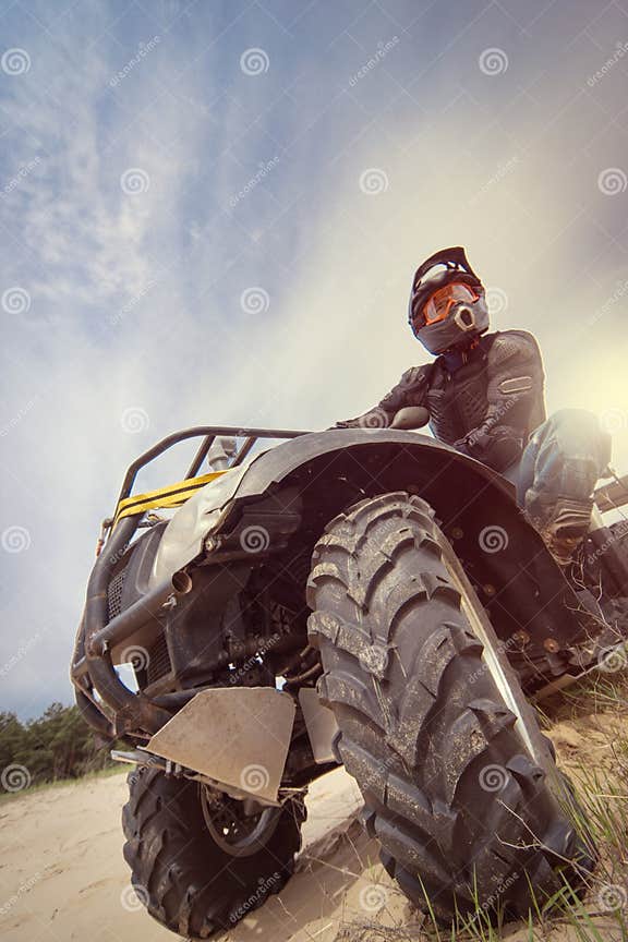 Racing ATV is sand. stock photo. Image of bikes, race - 72556404