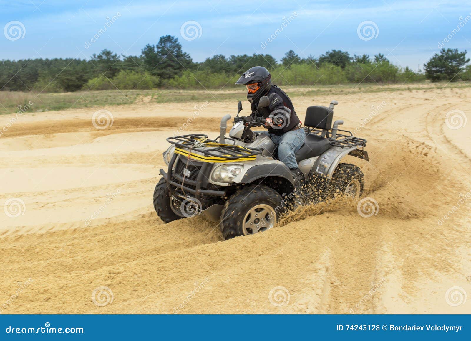 Racing ATV is sand. stock photo. Image of racer, quadbike - 74243128