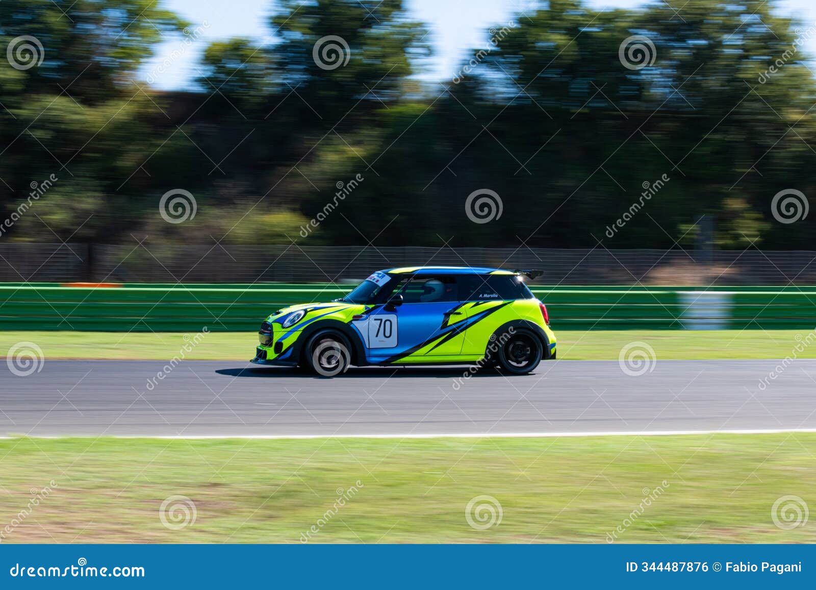 Racing Car Speeding on a Circuit during a Sunny Day Editorial Photo ...