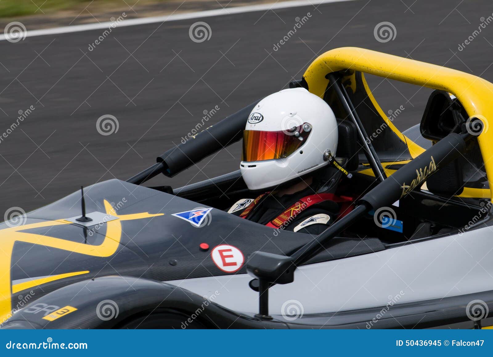 Racing Driver Sitting In Touring Car Cockpit Looking At Camera With ...