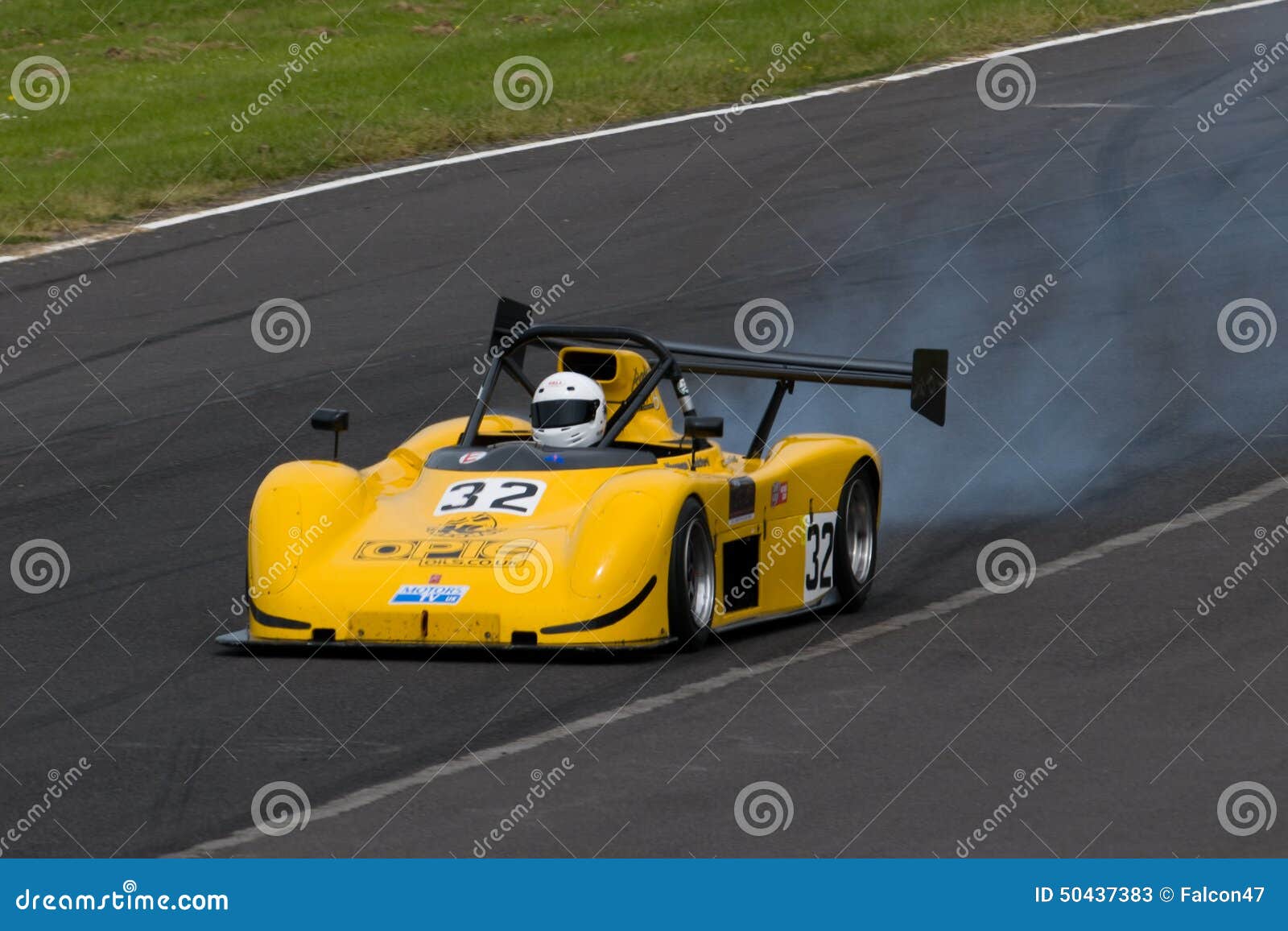 Racing Driver Sitting In Touring Car Cockpit Looking At Camera With ...