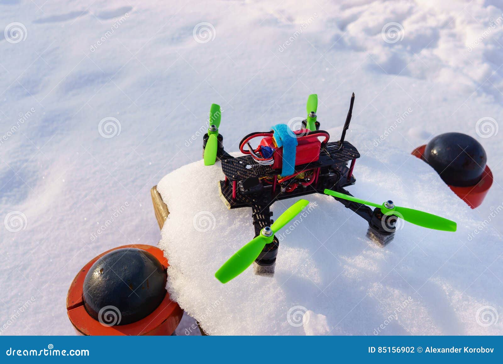 Racing Quadcopter on the Snow Stock Photo - Image of copter, green ...