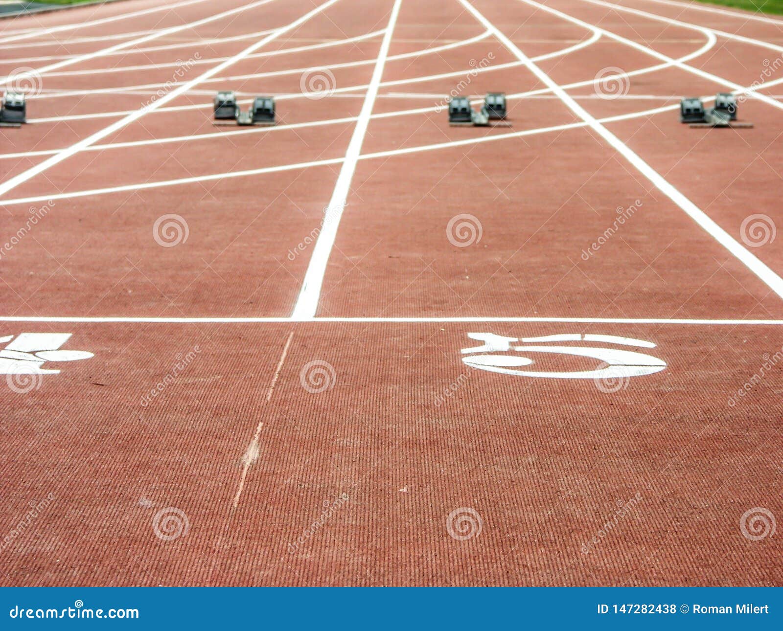 Racing Track with Starting Blocks Stock Photo - Image of contest ...