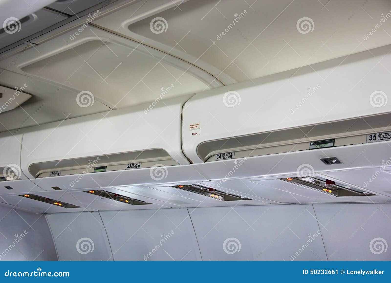 Rack in Airplane s Cabin stock image. Image of aircraft - 50232661