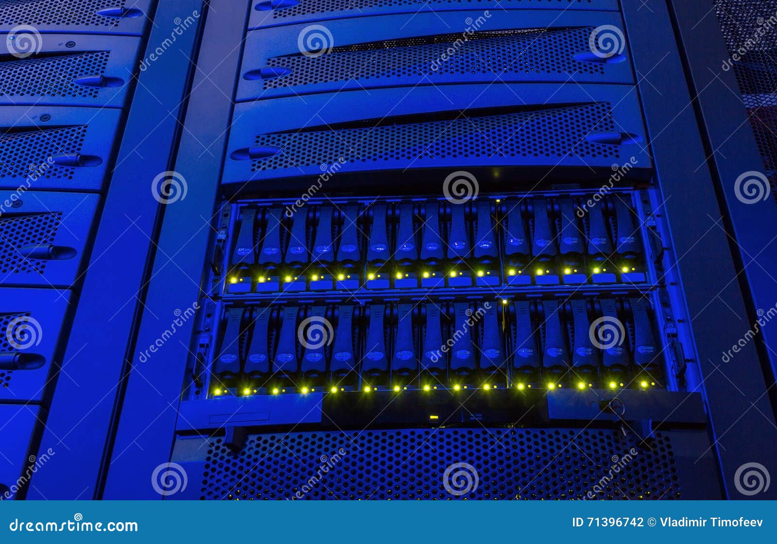 Rack with Blade Behind Bars Mainframe in the Data Center Stock Photo ...