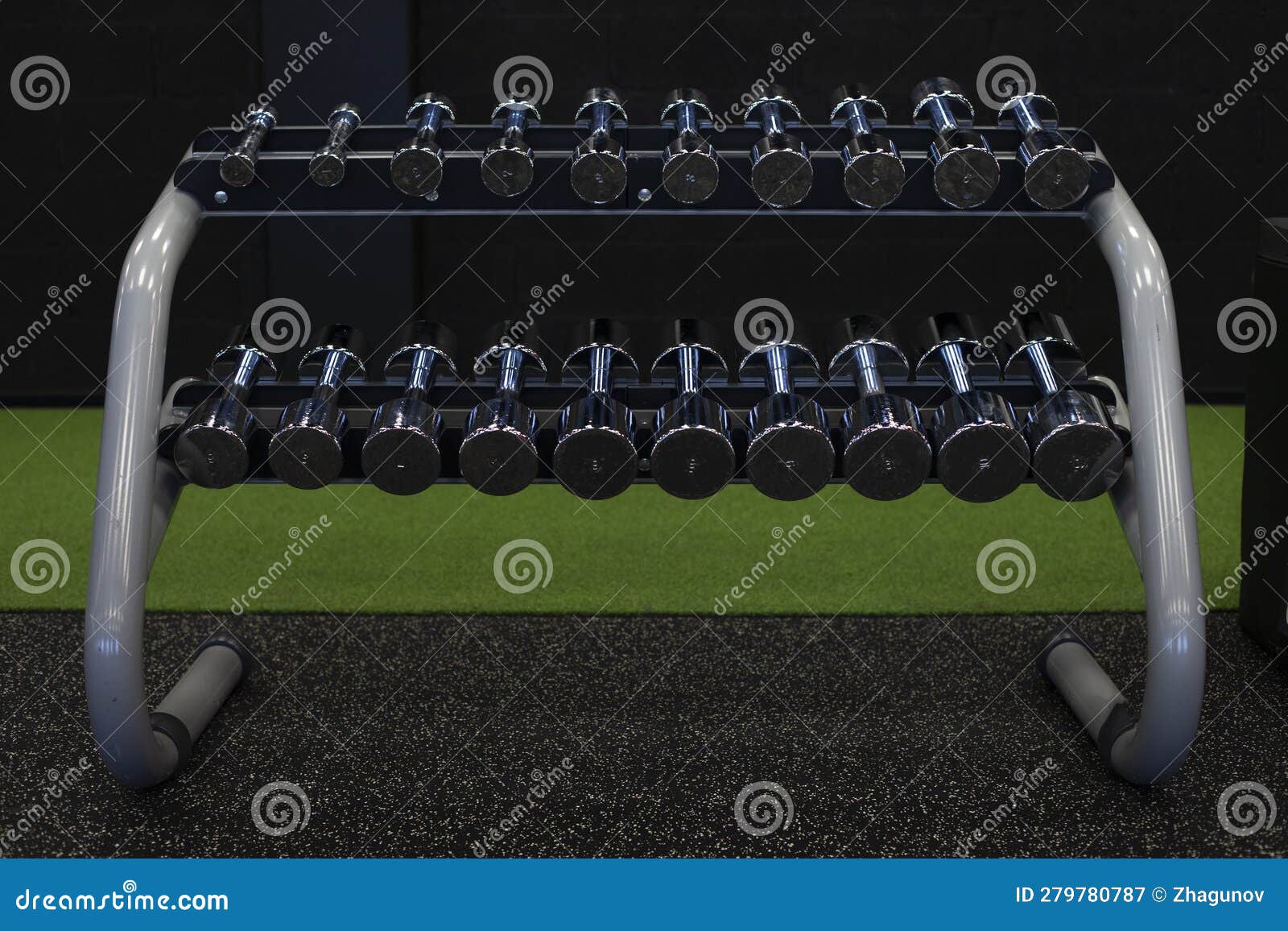 Rack with chrome dumbbells stock image. Image of healthy - 279780787