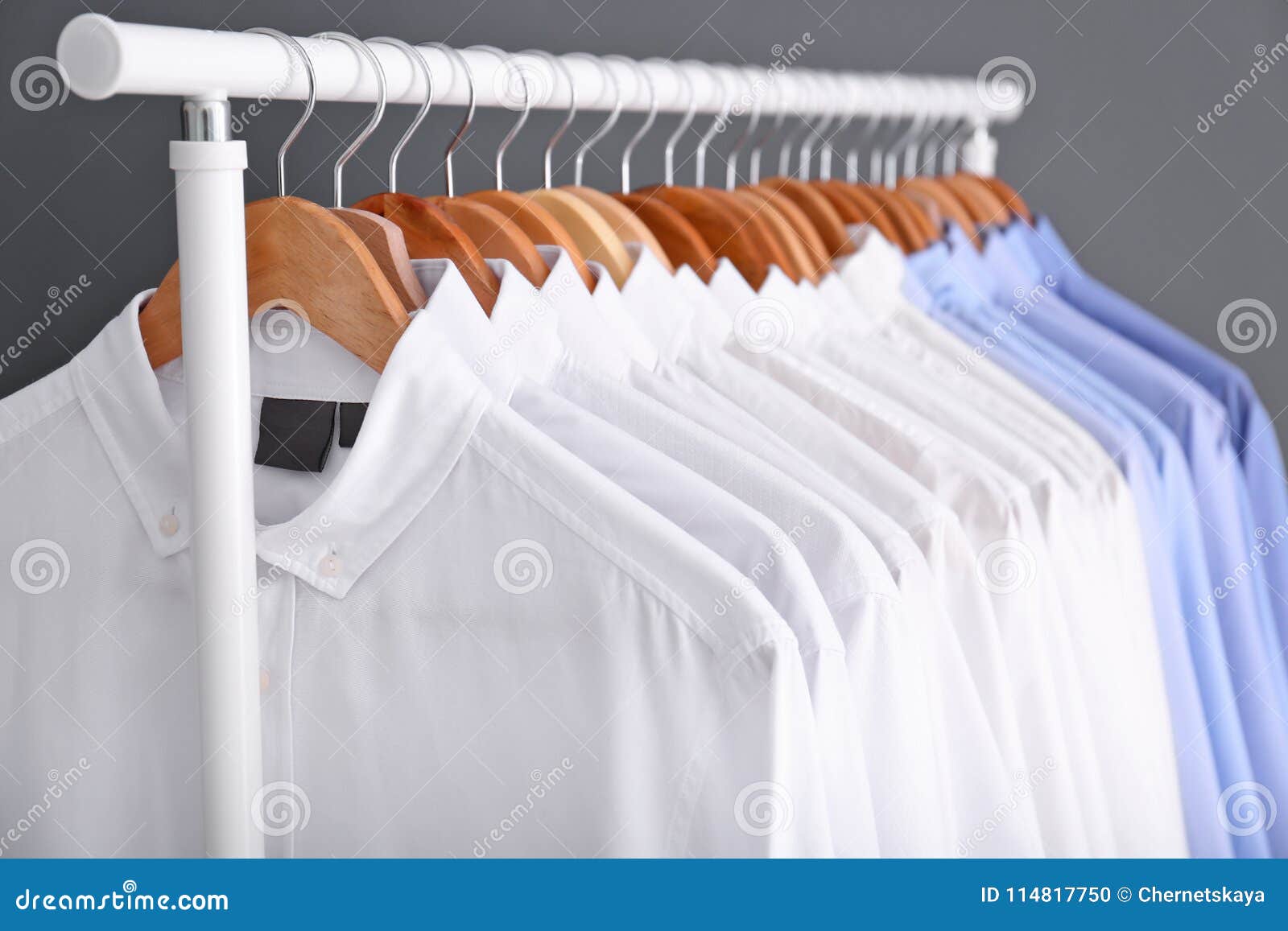 Rack with Clean Clothes on Hangers Stock Photo - Image of garment ...