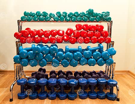 Rack with Colored Dumbbells Stock Image - Image of multicolored ...