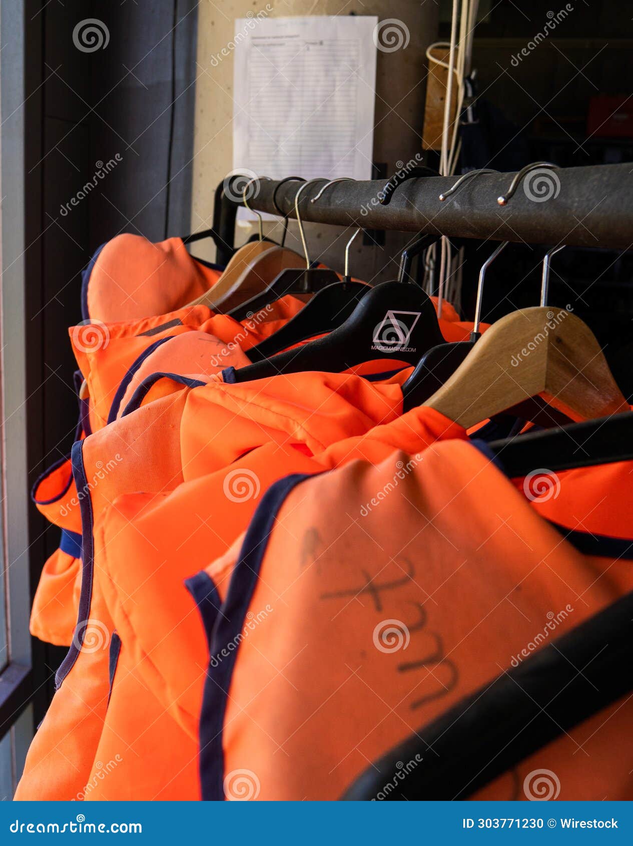 Rack of Emergency Floating Jackets on Hangers Stock Photo - Image of ...