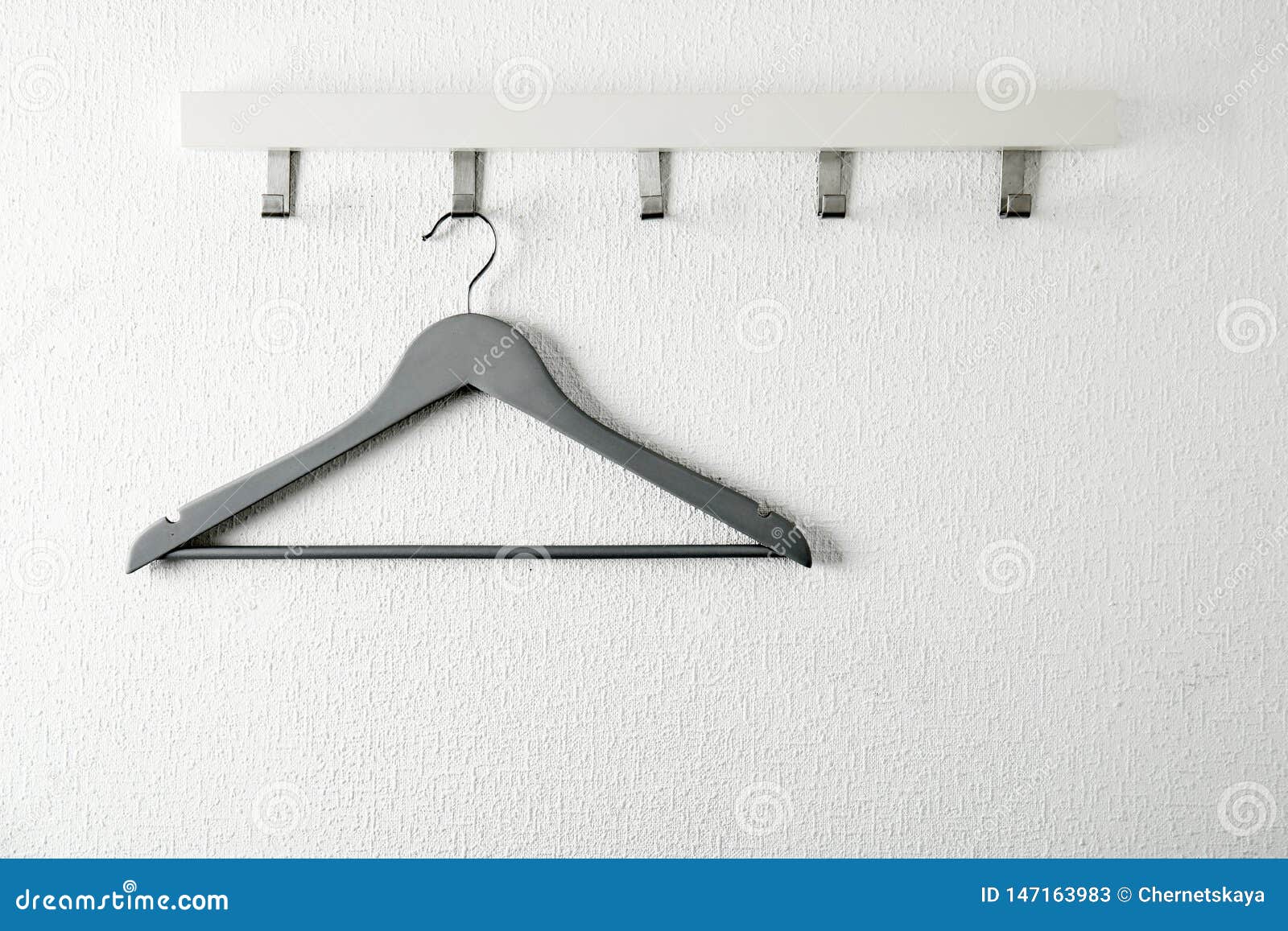 Rack with Empty Clothes Hanger. Wardrobe Accessory Stock Image - Image ...