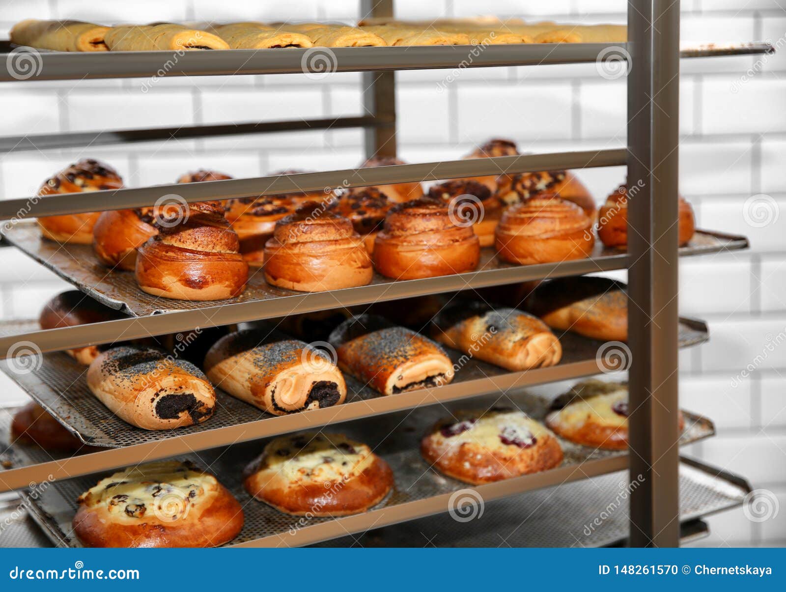 Rack with Pastries in Bakery Workshop Stock Photo - Image of bread ...