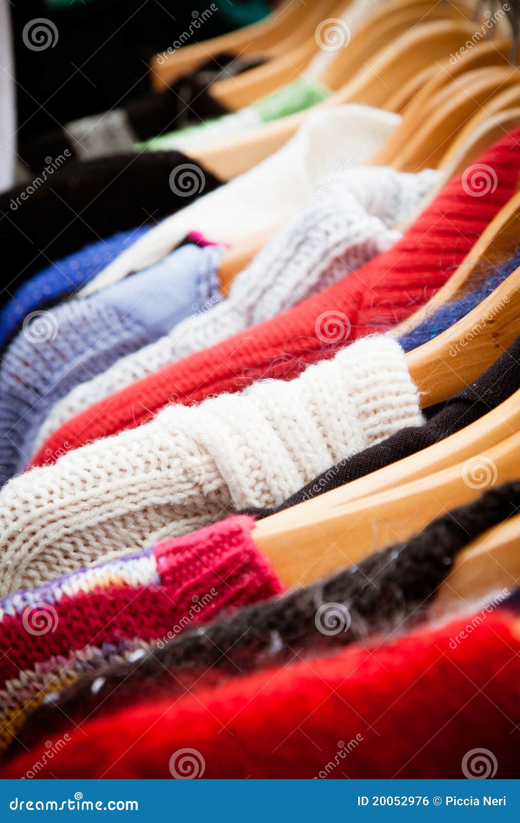 Rack of Jumpers at Market, Close-up Stock Photo - Image of multi ...
