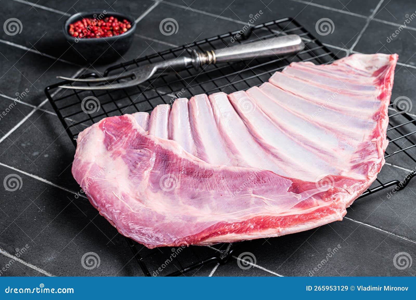 Rack of Lamb, Raw Mutton Ribs on Kitchen Table with Spices. Black ...