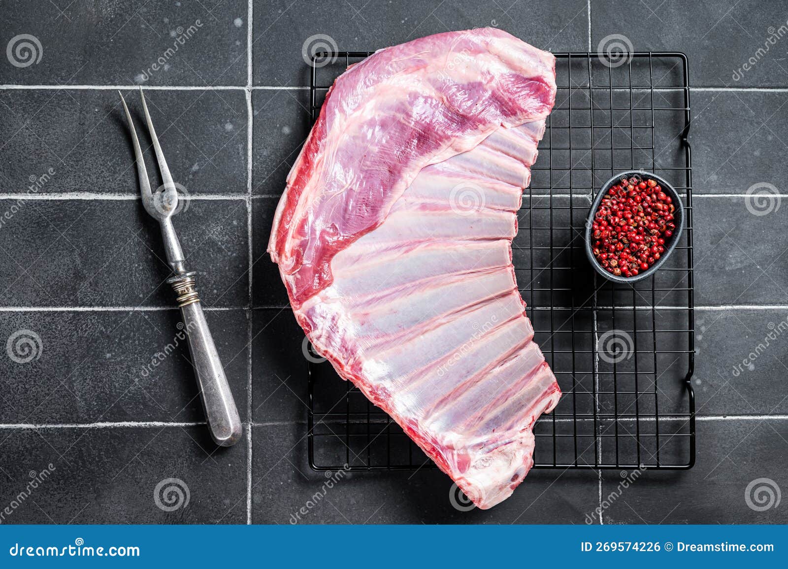 Rack of Lamb, Raw Mutton Ribs on Kitchen Table with Spices. Black ...