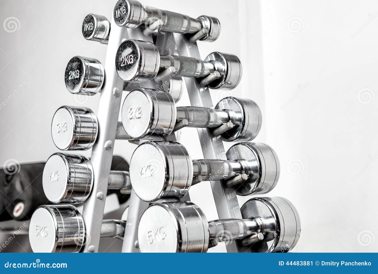 Rack with metal dumbbells. stock image. Image of dumbbells - 44483881