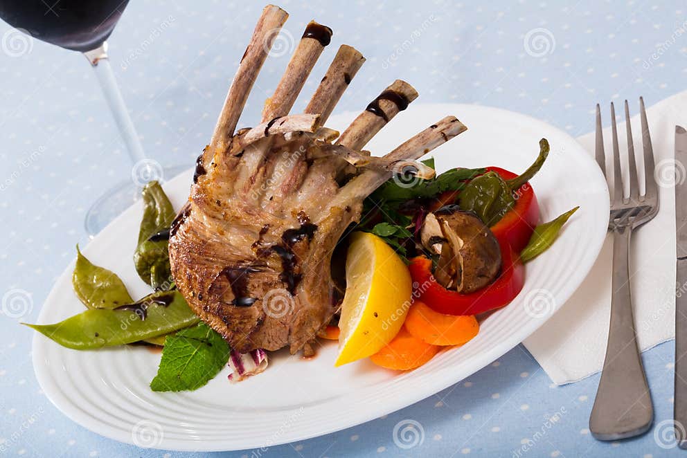 Roasted Rectangle Lamb Rack Stock Photo - Image of lamb, champignons ...