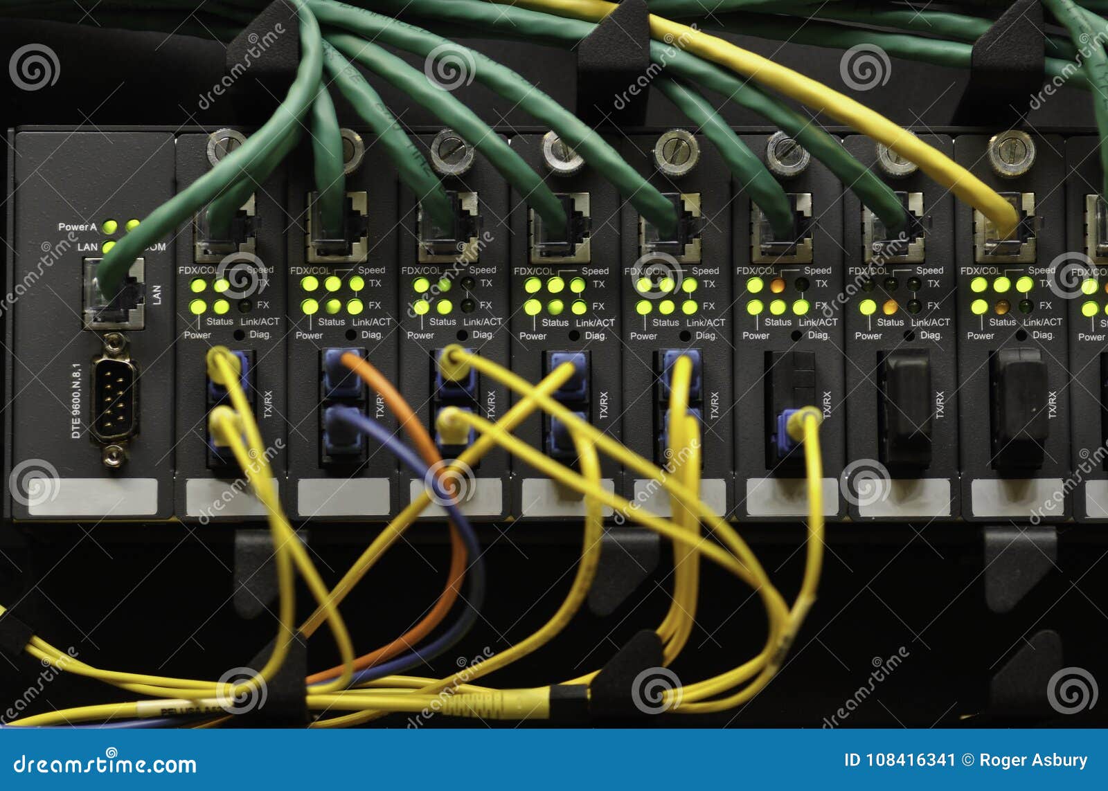 A rack of network gear stock image. Image of convert - 108416341