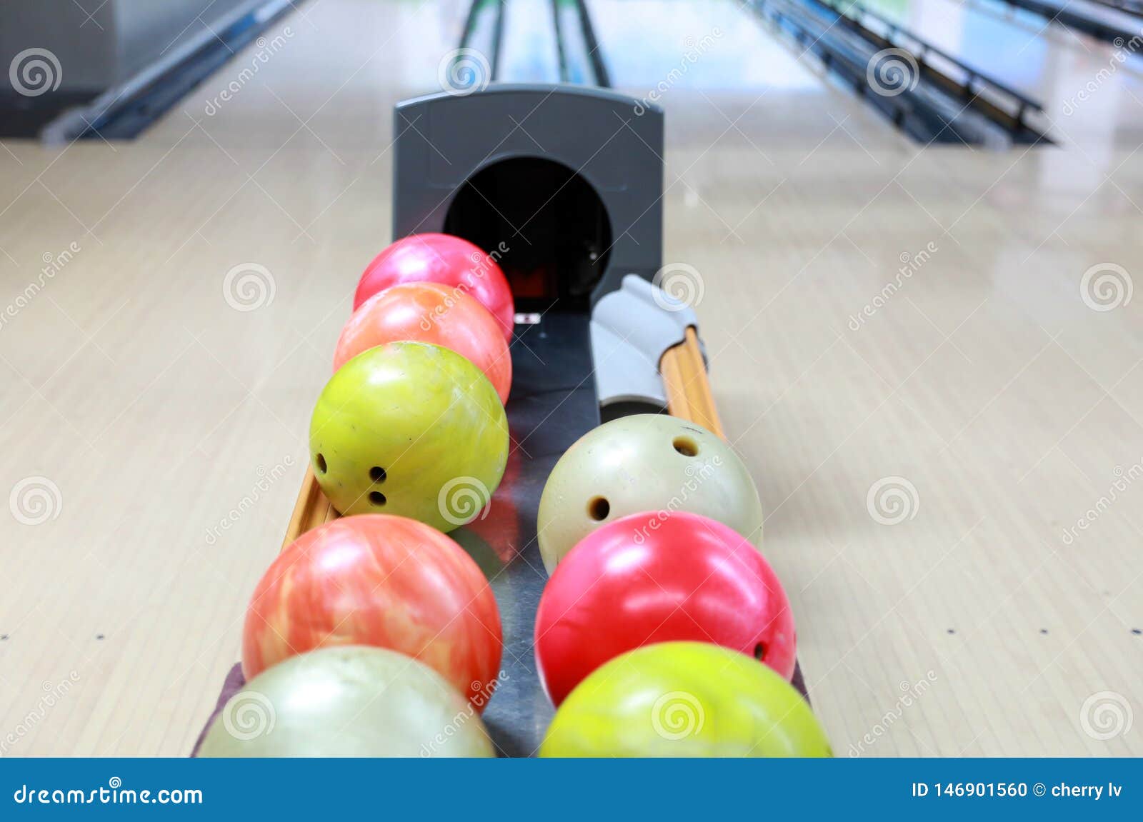 A Rack of Old Worn Bowling Balls Stock Photo - Image of colorful, green ...