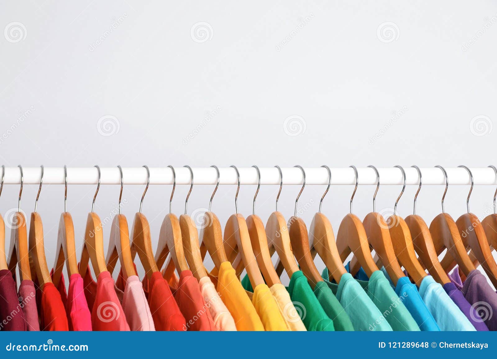 Rack with rainbow clothes stock photo. Image of rack - 121289648