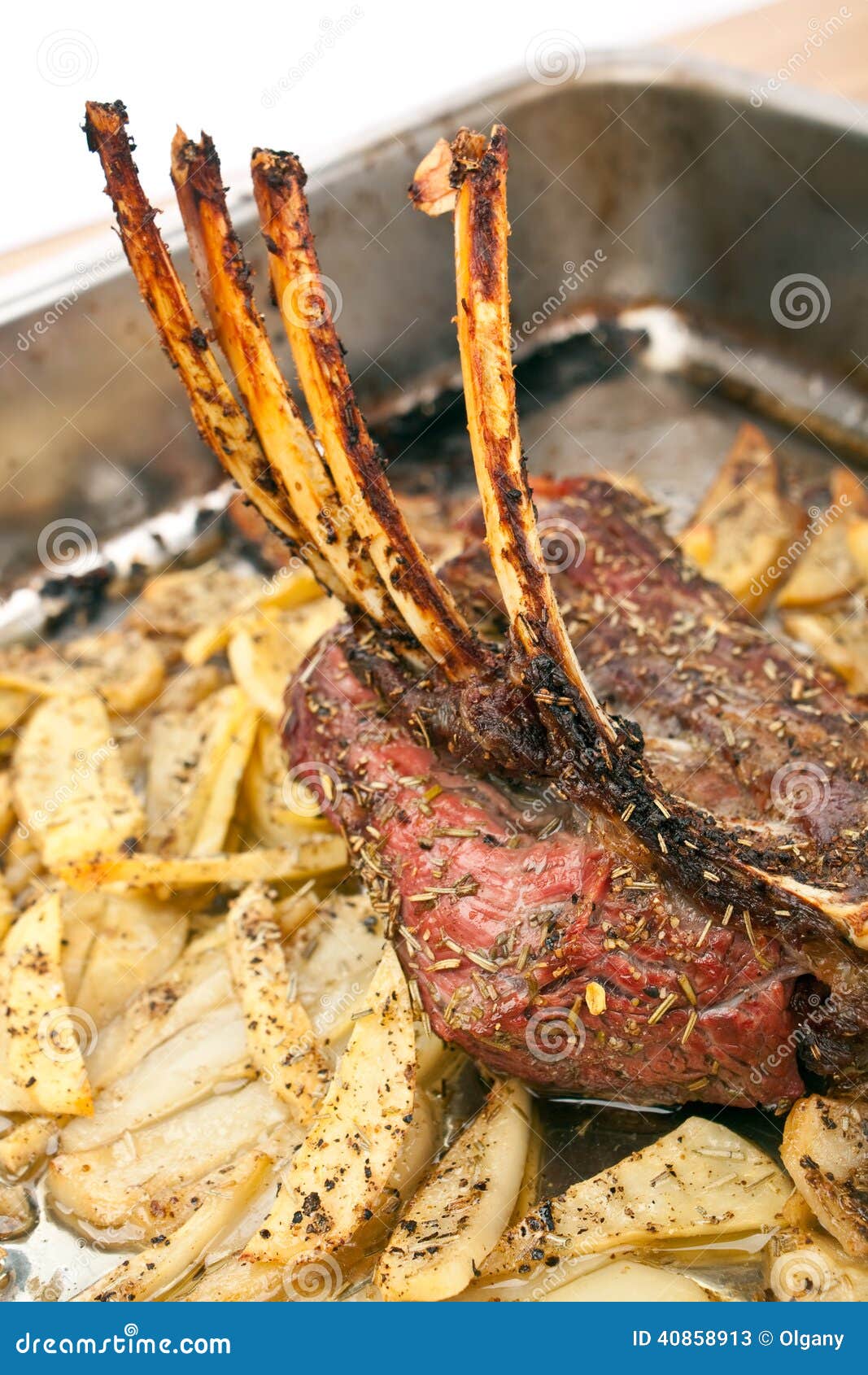 Rack of Ribs with Potatoes stock image. Image of prime - 40858913