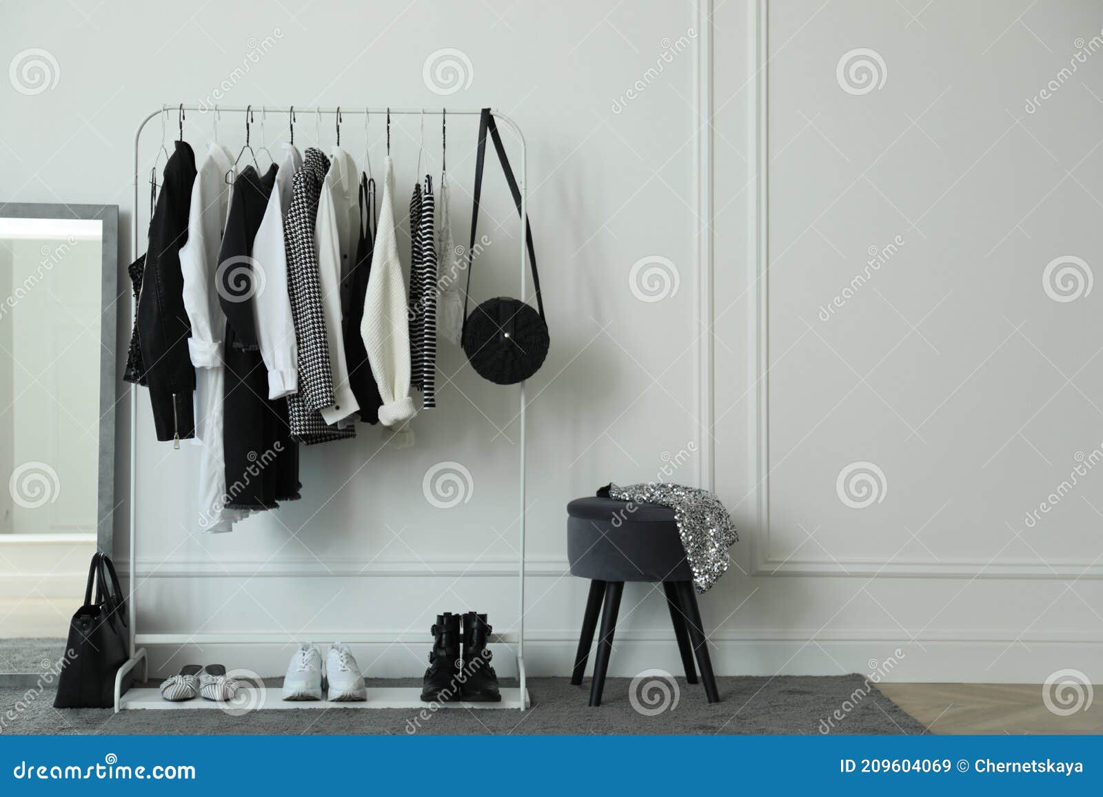 Rack with Stylish Clothes in Modern Dressing Room Stock Image - Image ...