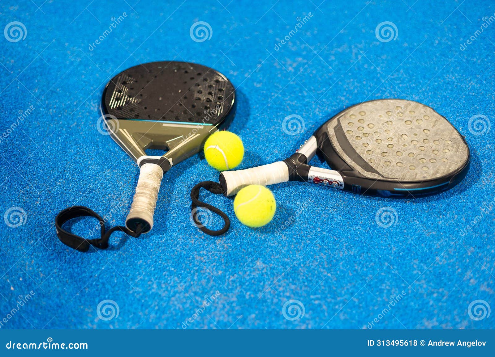 Rackets Paddle with Two Balls on Blue Background Stock Photo - Image of ...
