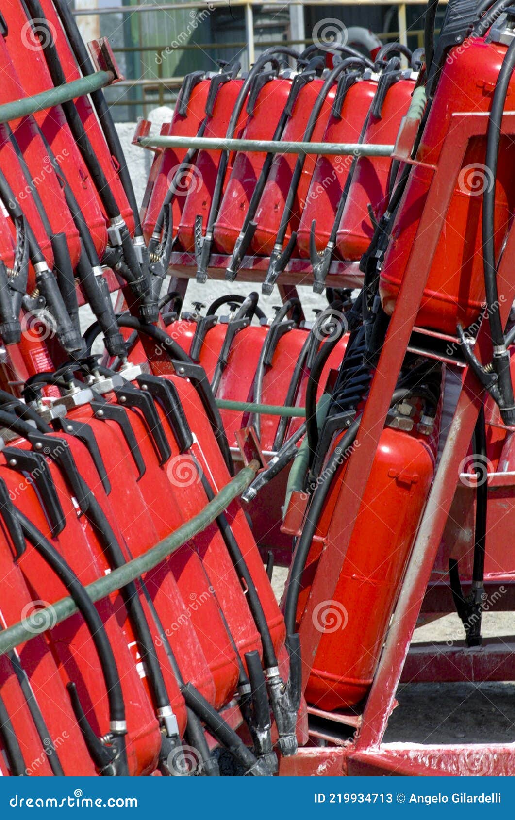 Racks of Fire Extinguishers, Firefighter Equipment Stock Image - Image ...