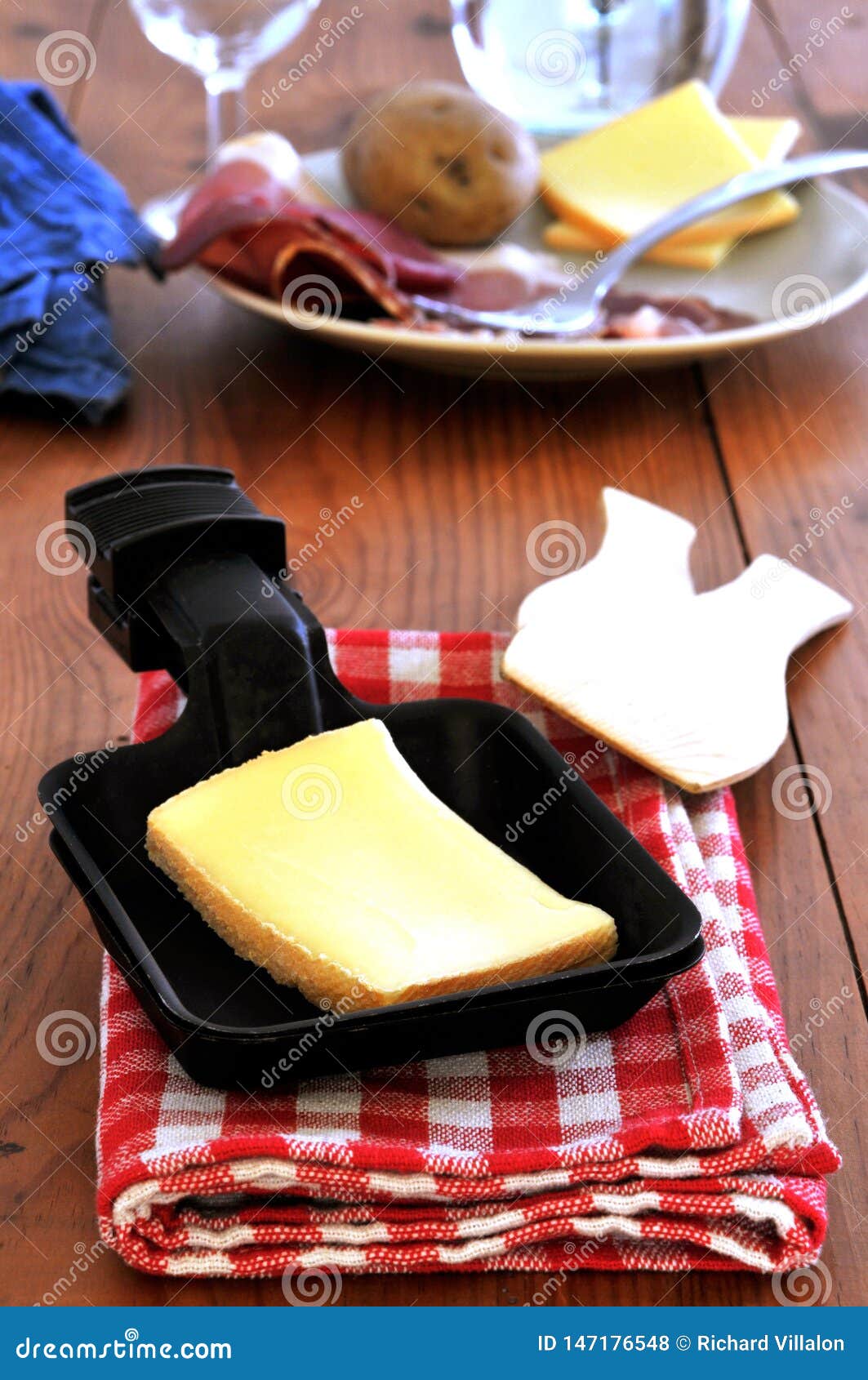 Cheese in a raclette pan stock photo. Image of food - 147176548