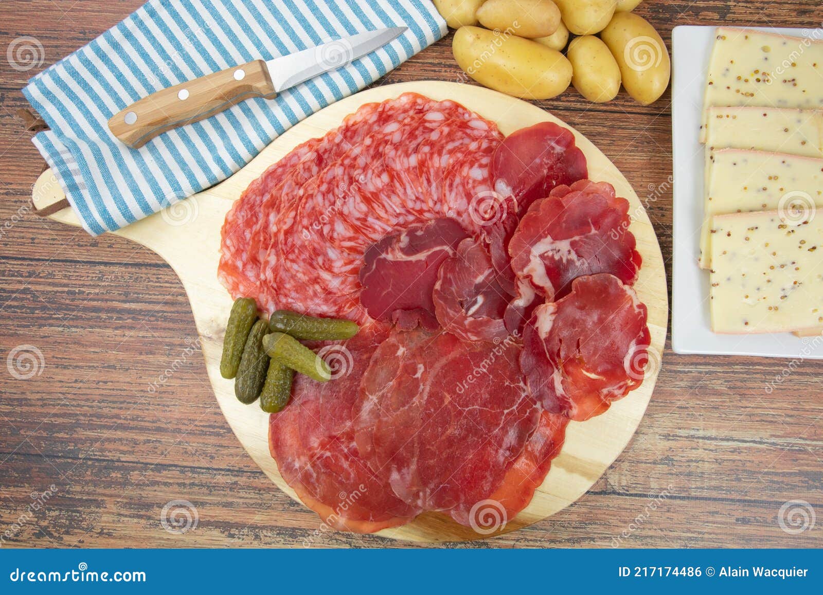 Raclette Cheese and Cold Cuts on a Table Stock Photo - Image of sausage ...