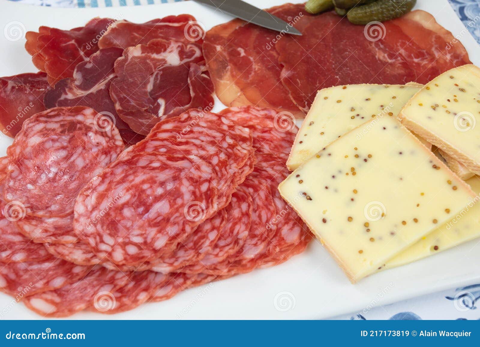 Raclette Cheese and Cold Cuts on a Table Stock Image - Image of slices ...