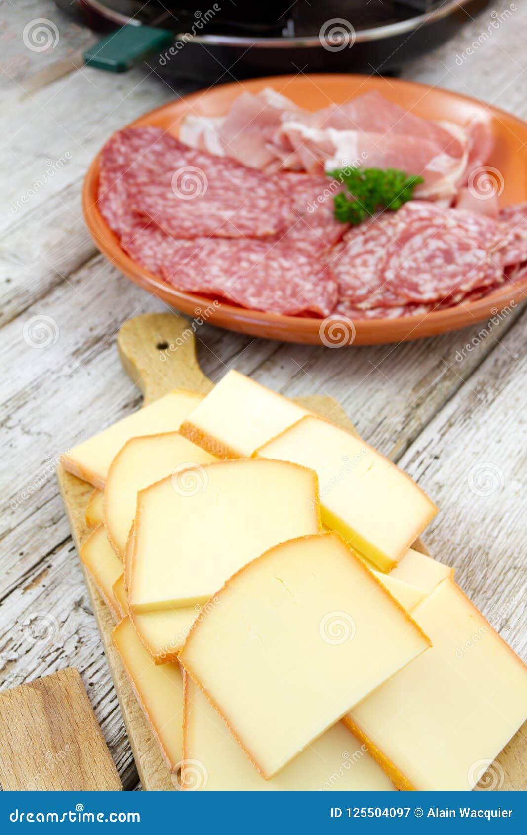 Raclette cheese stock image. Image of melted, delicious - 125504097