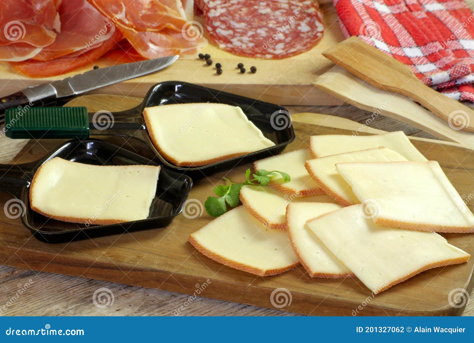 Raclette Cheese Slices and Cold Cuts Stock Photo - Image of ...