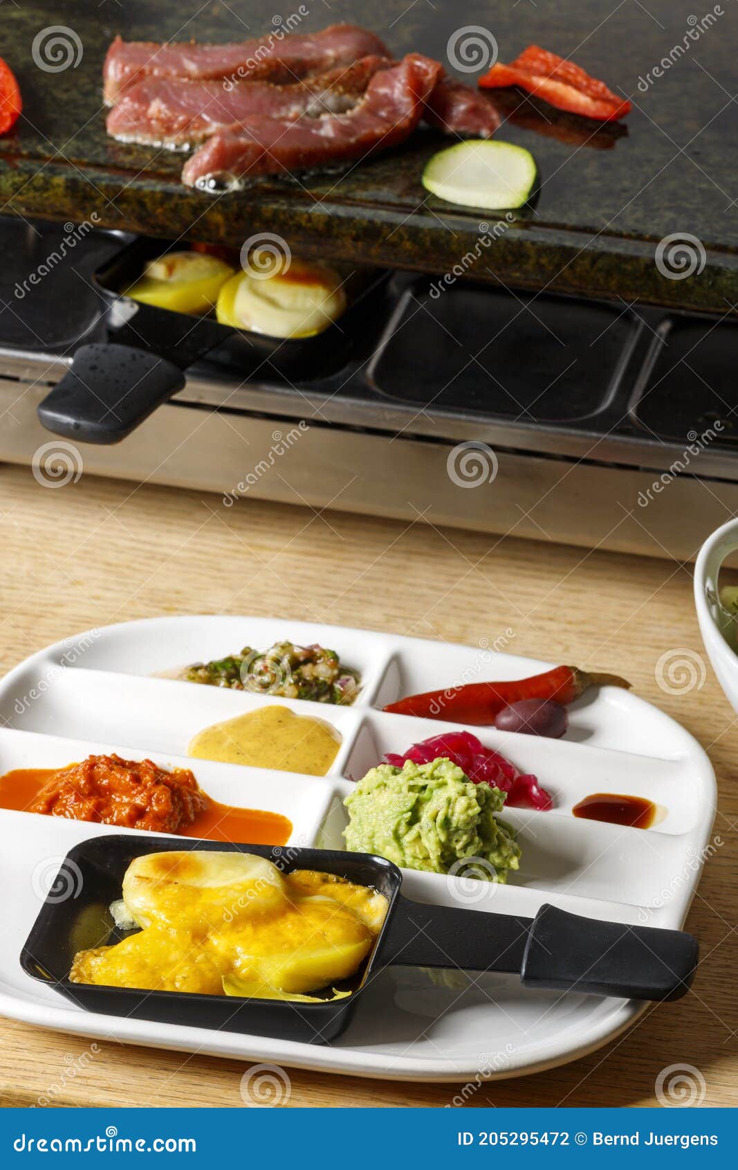 Raclette stock photo. Image of aivar, baked, party, mustard - 205295472