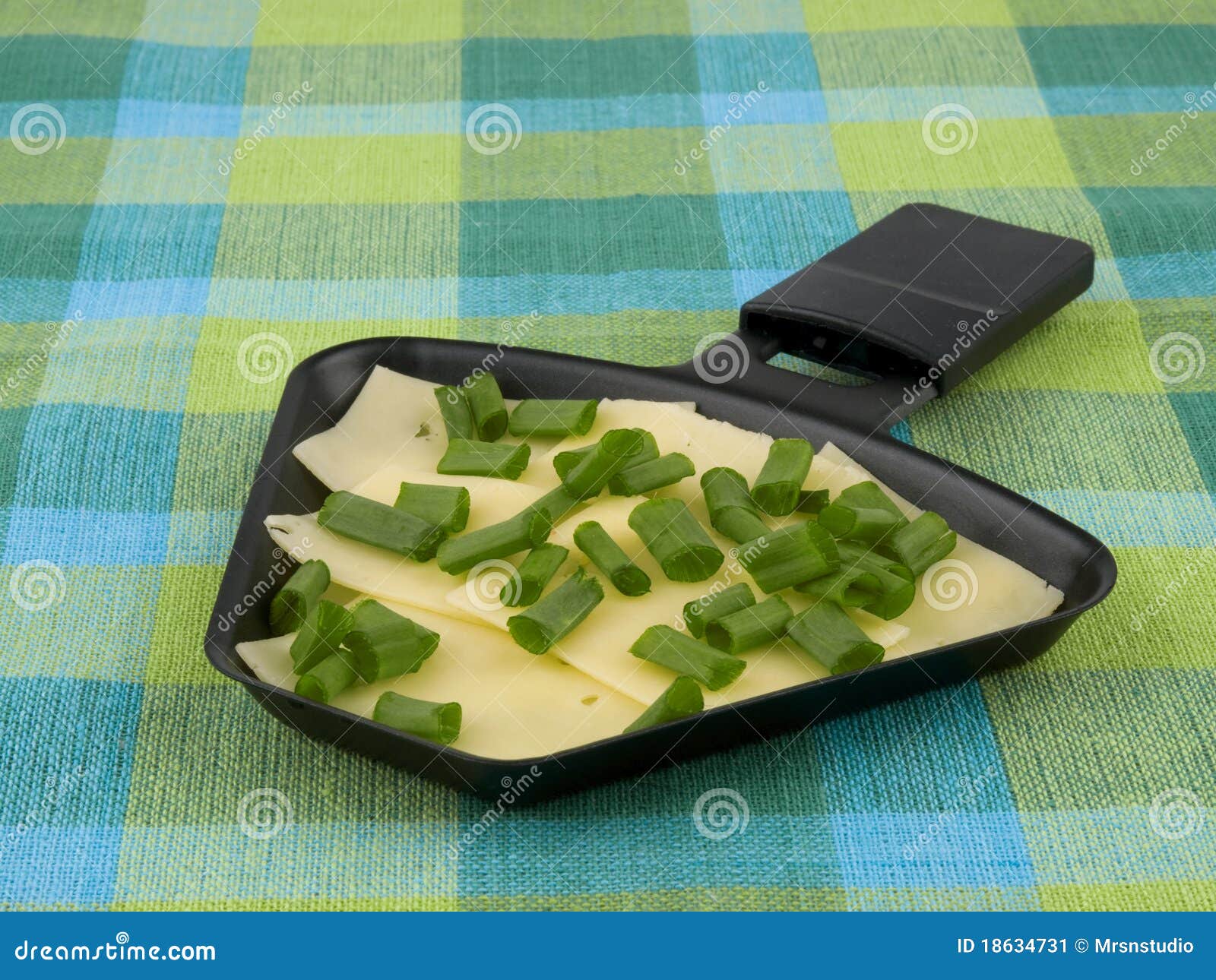 Raclette Pan with Cheese and Spring Onion Stock Image - Image of party ...