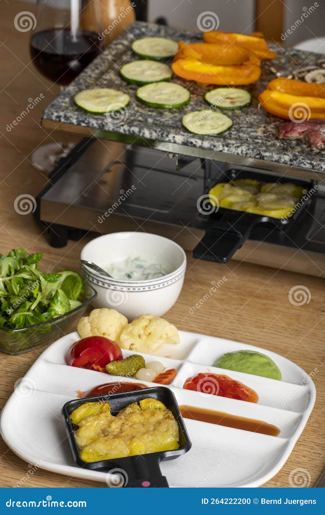 Raclette with potatoes stock photo. Image of gastronomy - 264222200