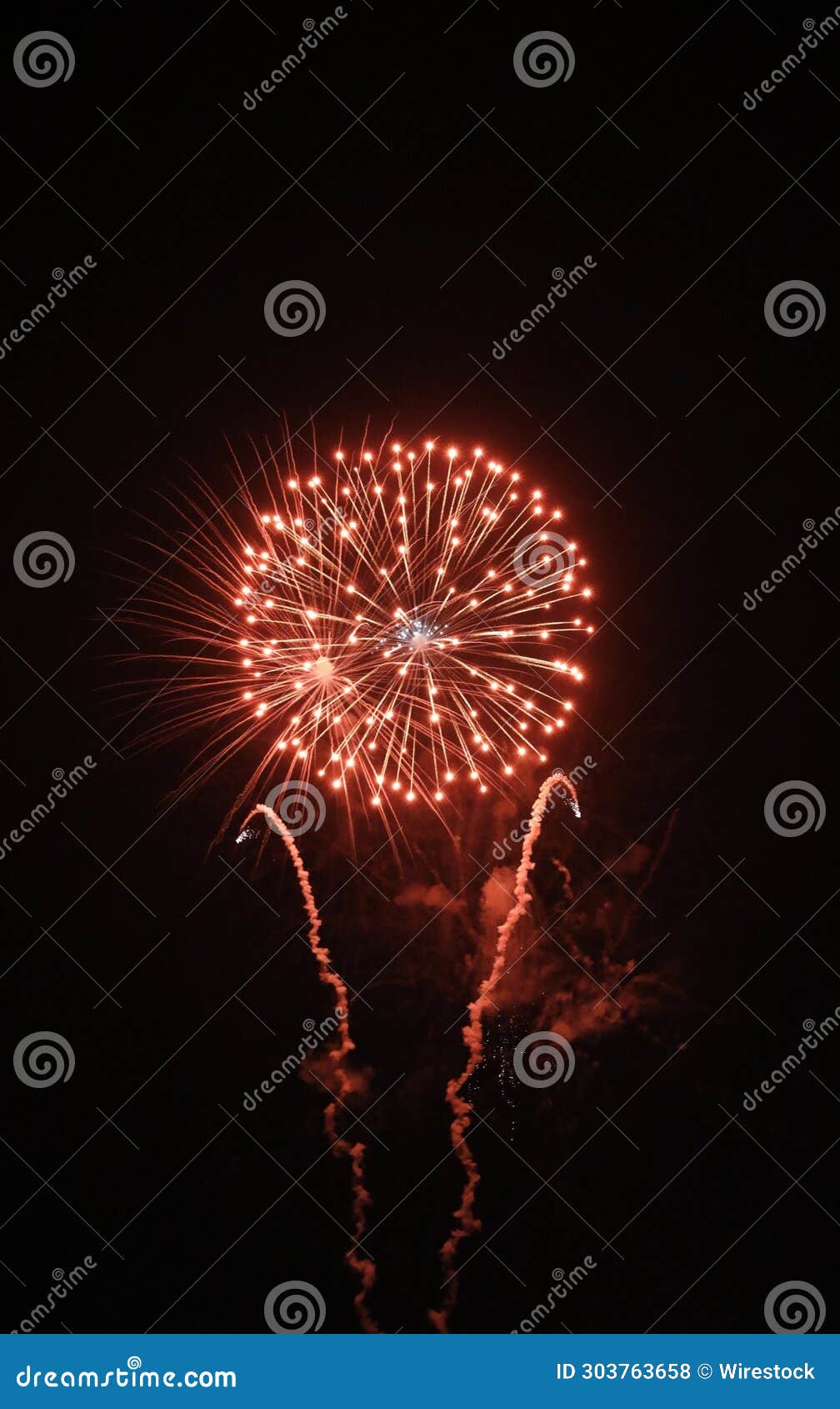 Radiant Night Sky Illuminated by Cascading Exploding Red Fireworks ...