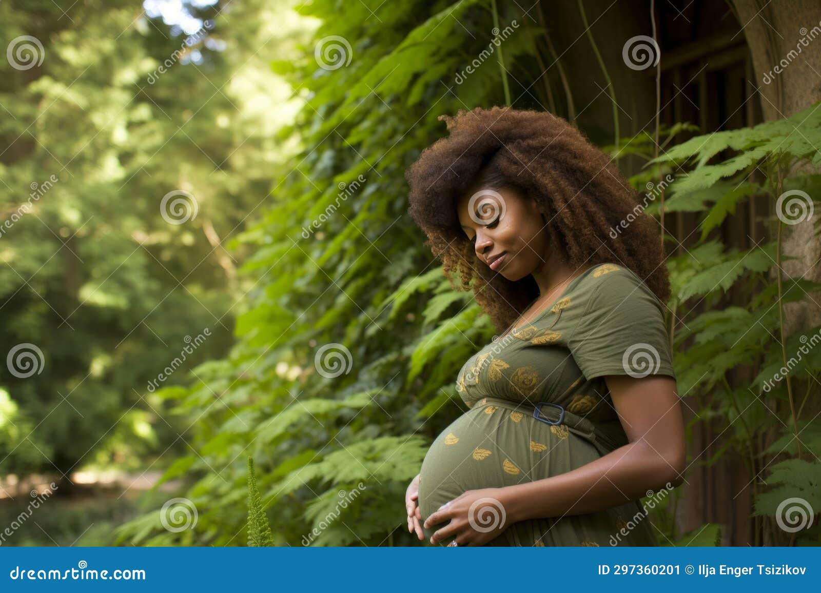 Radiant Pregnant Woman With A Blissful Smile Gently Caressing Her