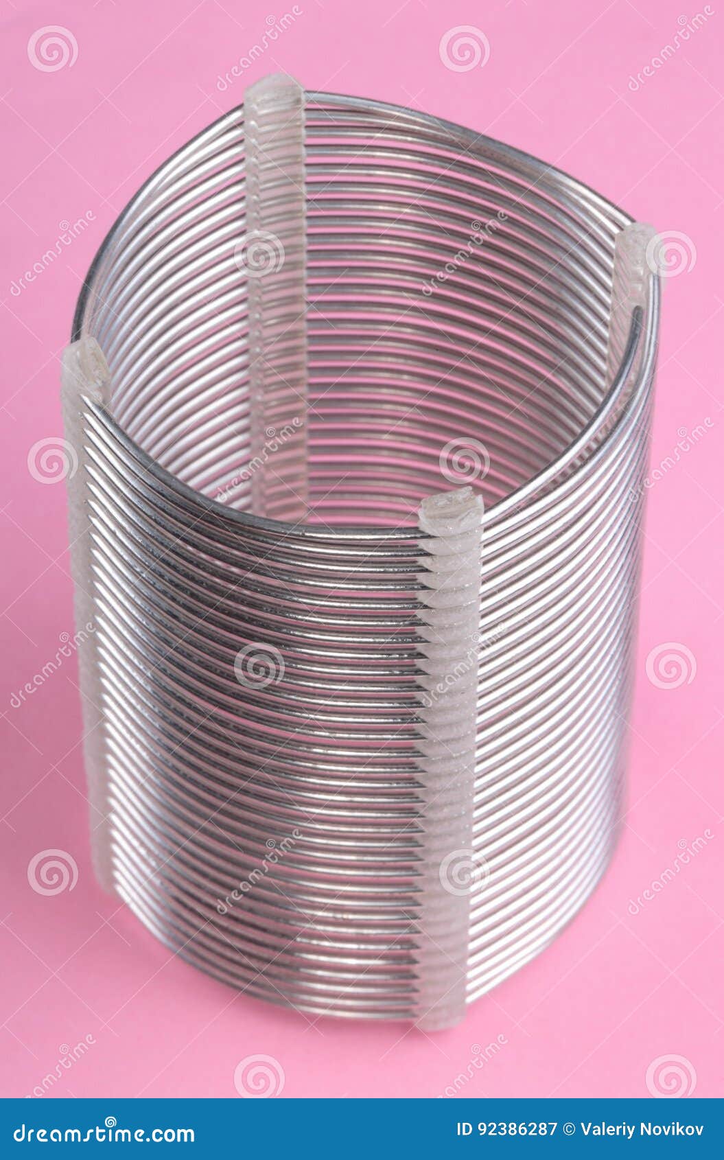 Radio Coil on Pink Background Stock Image - Image of silver, metal ...