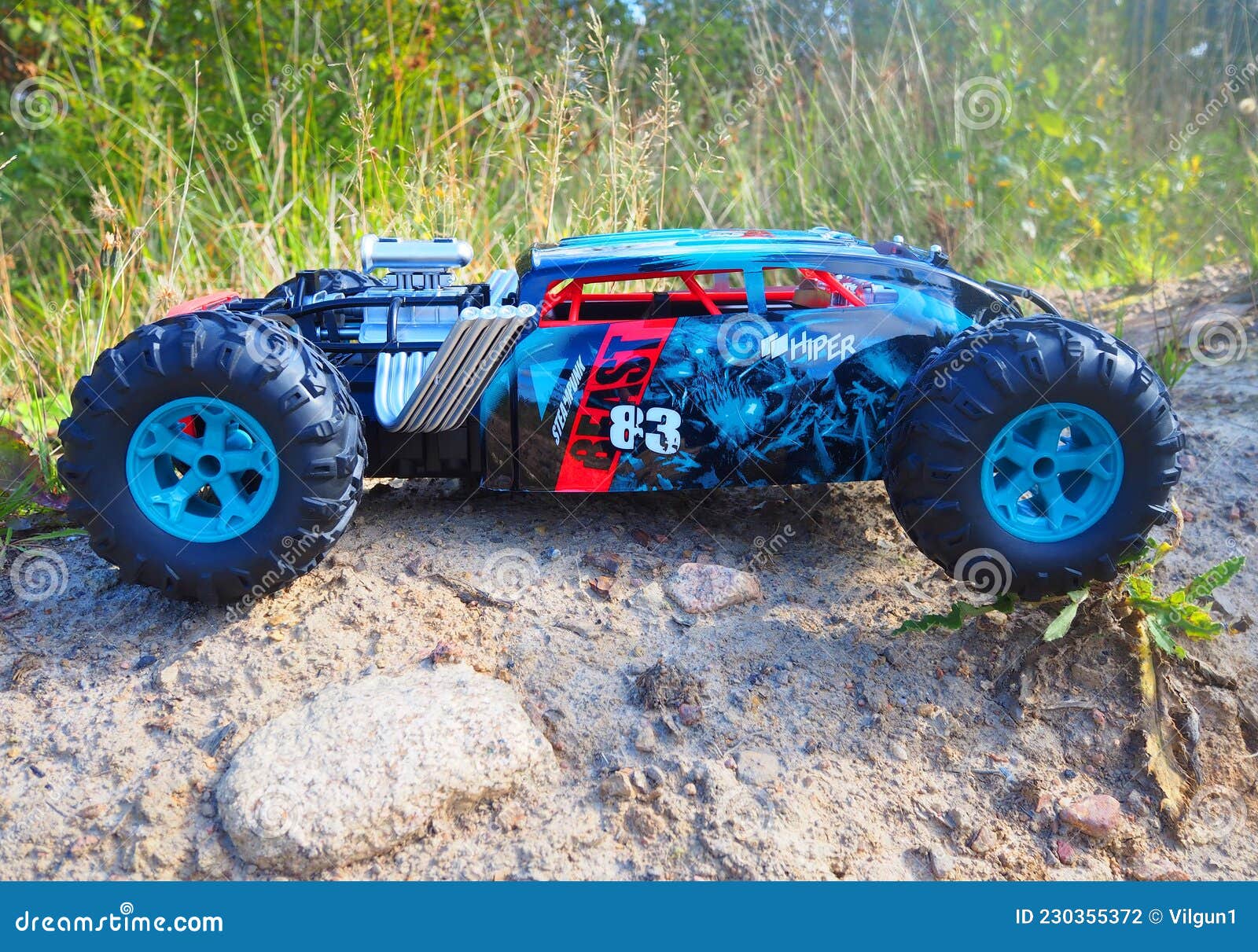 A Radio-controlled Car with a Remote Control. Close-up and Details of a ...