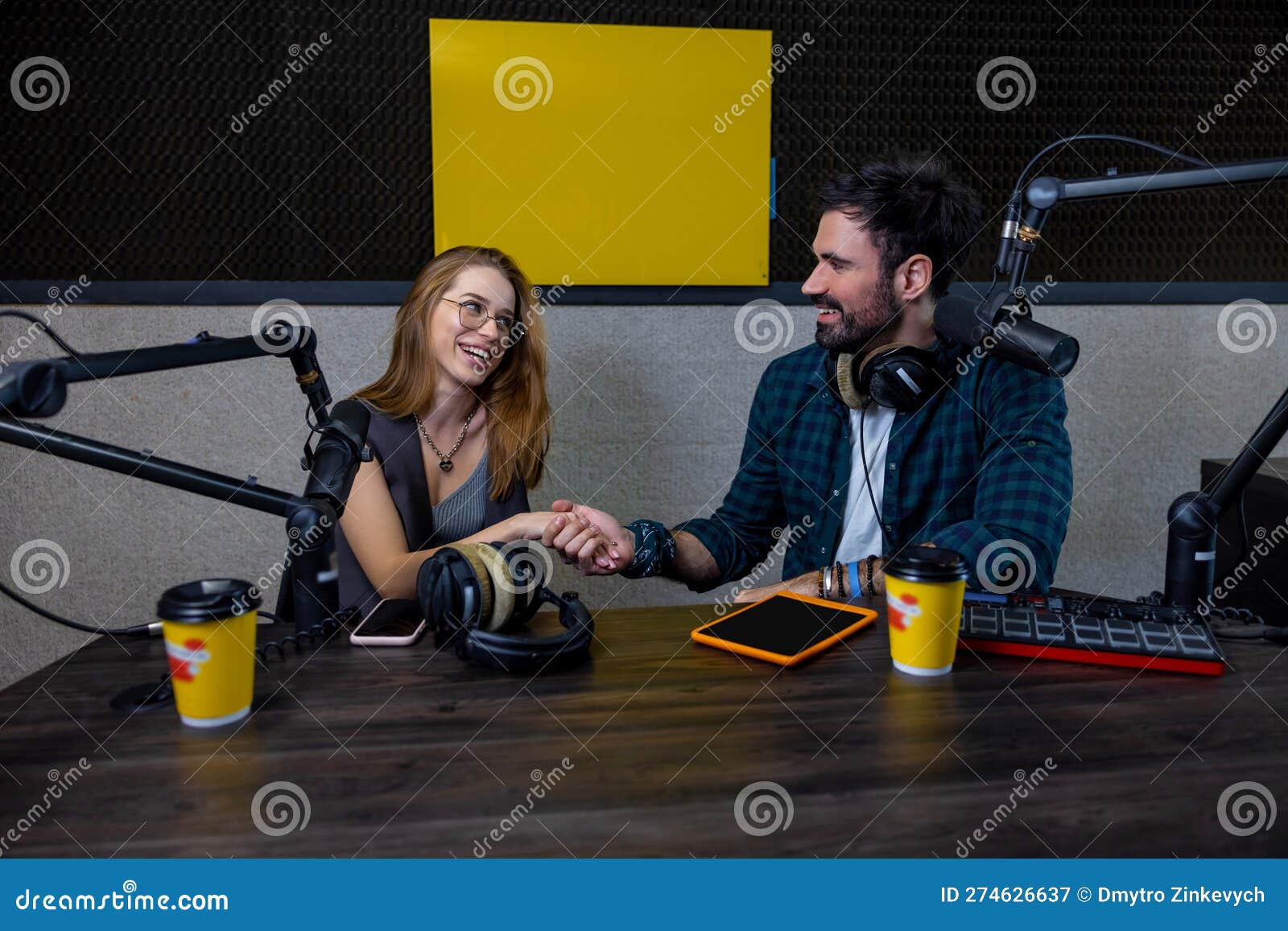 Radio Dj Talking To a Studio Guest and Looking Contented Stock Image ...