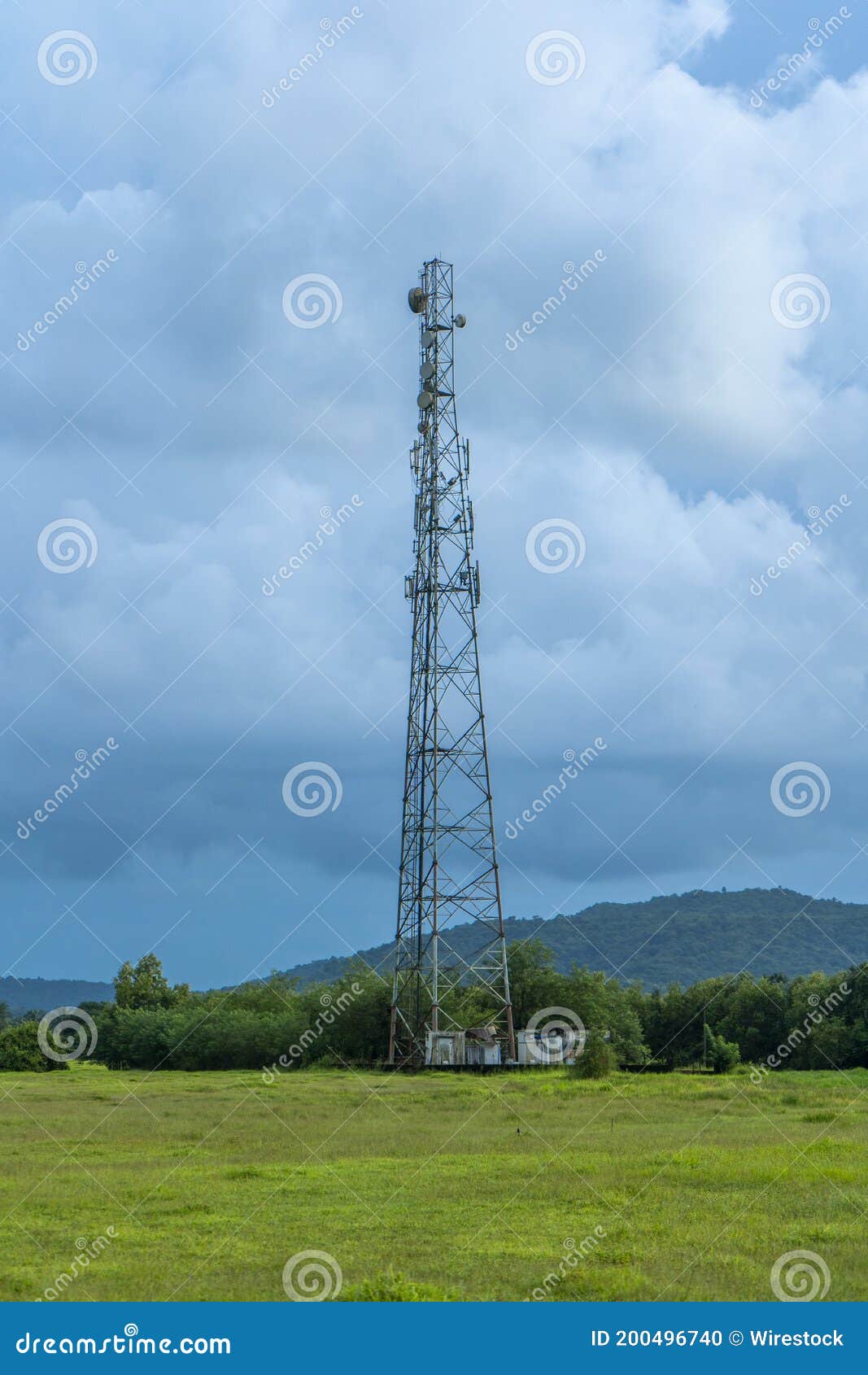 Radio Tower in a Beautiful Green Field Stock Photo - Image of ...