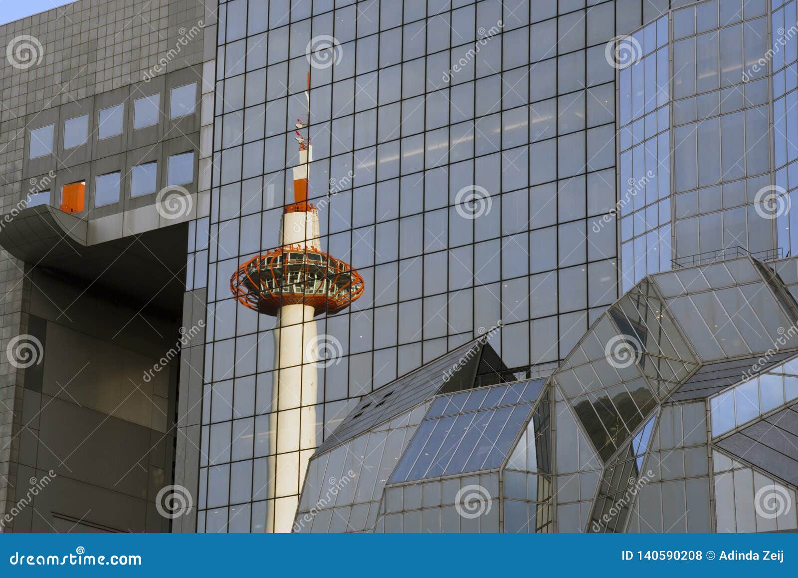 The Radio Tower in Kyoto is Reflected in the Facade of the Station ...