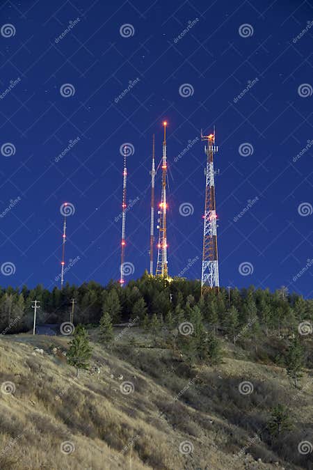 Radio towers at night stock photo. Image of cellular - 12130670