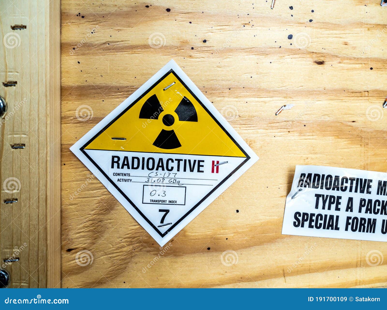 Radioactive Material Warning Label beside the Transportation Wooden ...