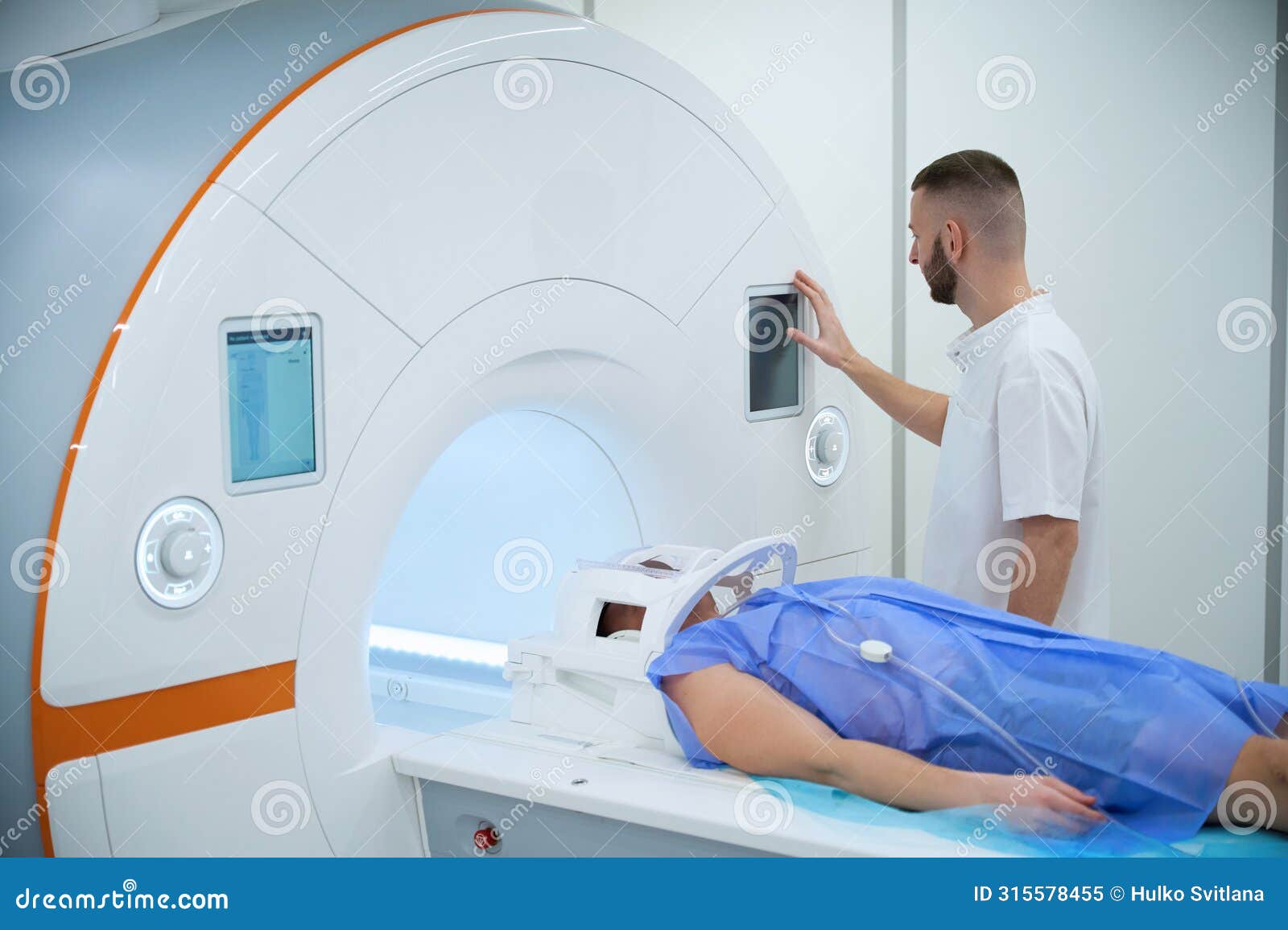 Technologist Positioning Outpatient for Magnetic Resonance Imaging of ...