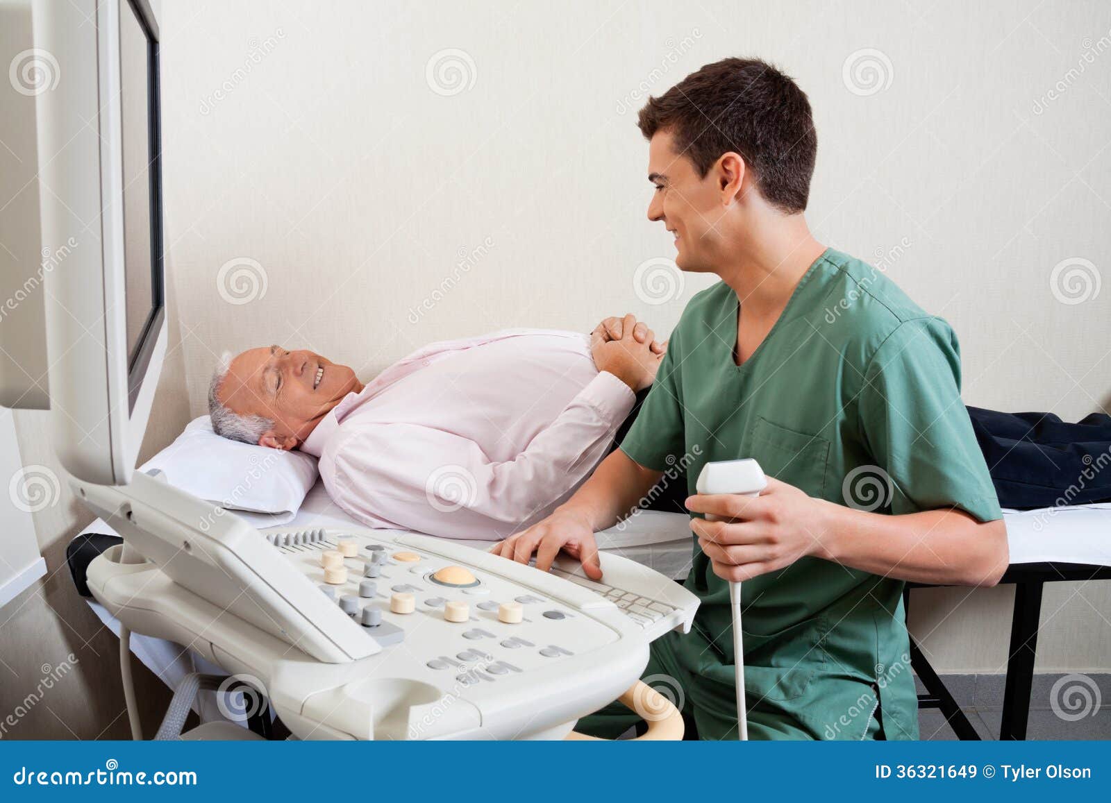 Radiologic Technician Smiling at Patient Stock Image - Image of ...